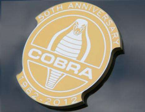 The badge of the 50th Anniversary Shelby Cobra | Torque News